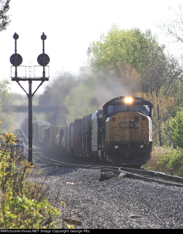 CSX 8764 and train Q410